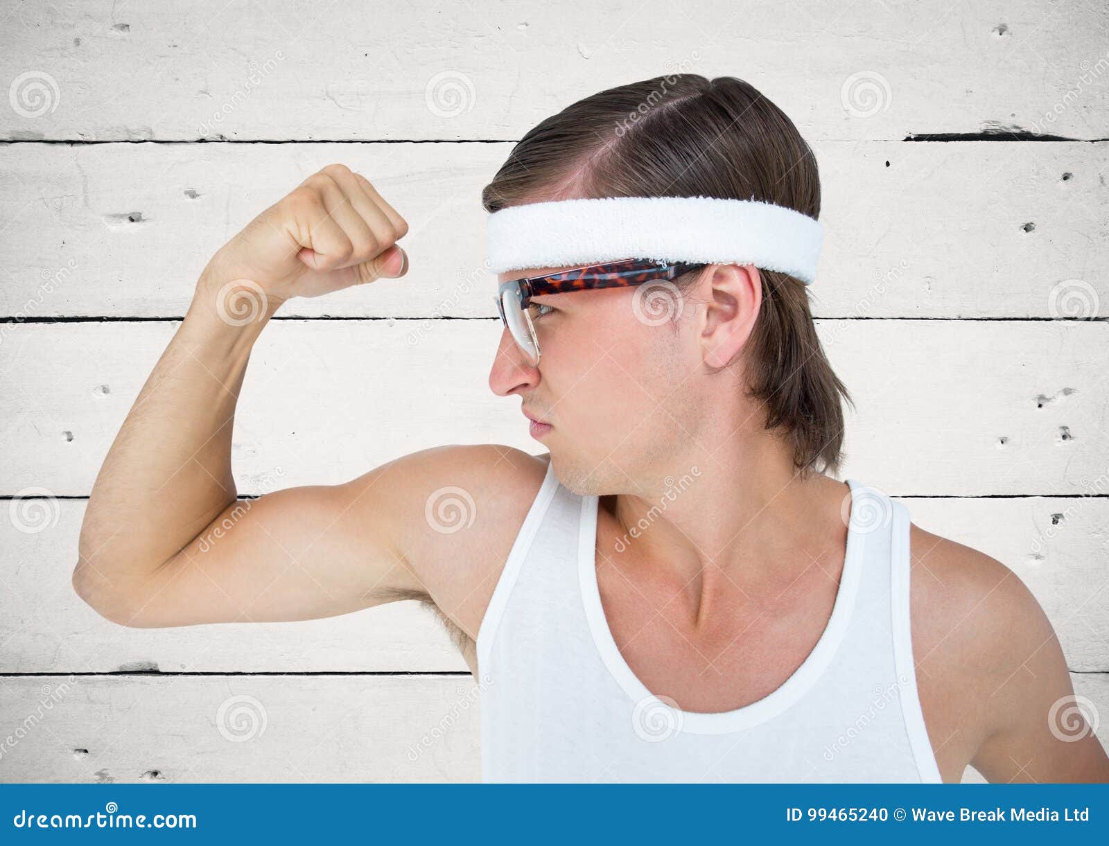 Nerd Flexing Against White Wood Panel Stock Photo - Image of sweatband ...