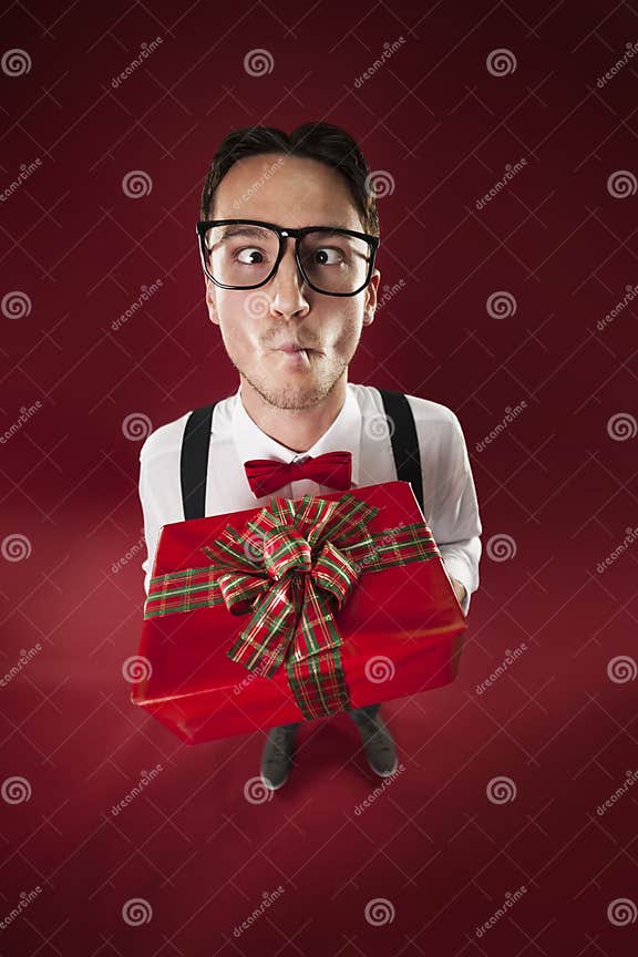 Nerd guy with gift stock photo. Image of celebration - 35563284