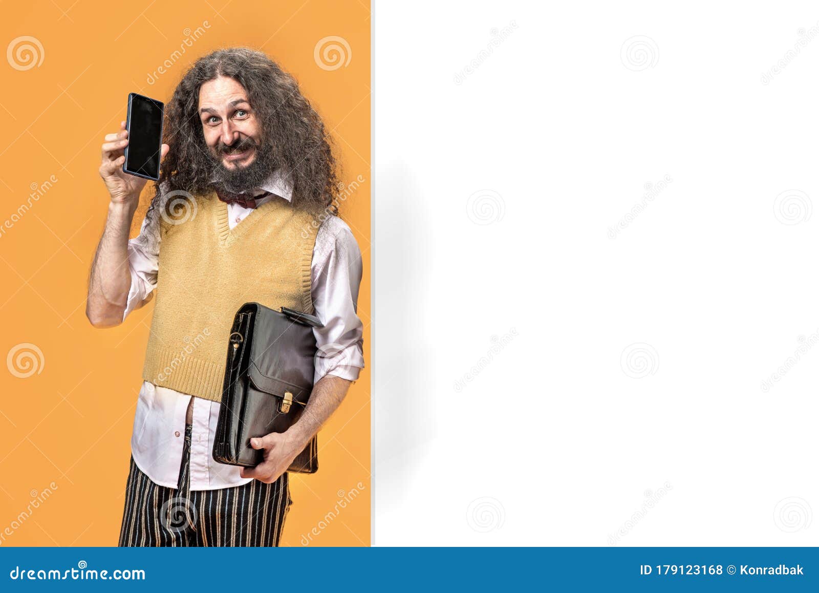 Nerd Guy Posing with a Mobile Phone Next To the Empty Board Stock Photo ...