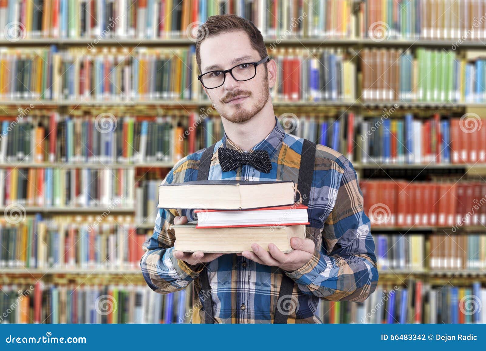 Nerd in library stock photo. Image of student, nerd, learn - 66483342