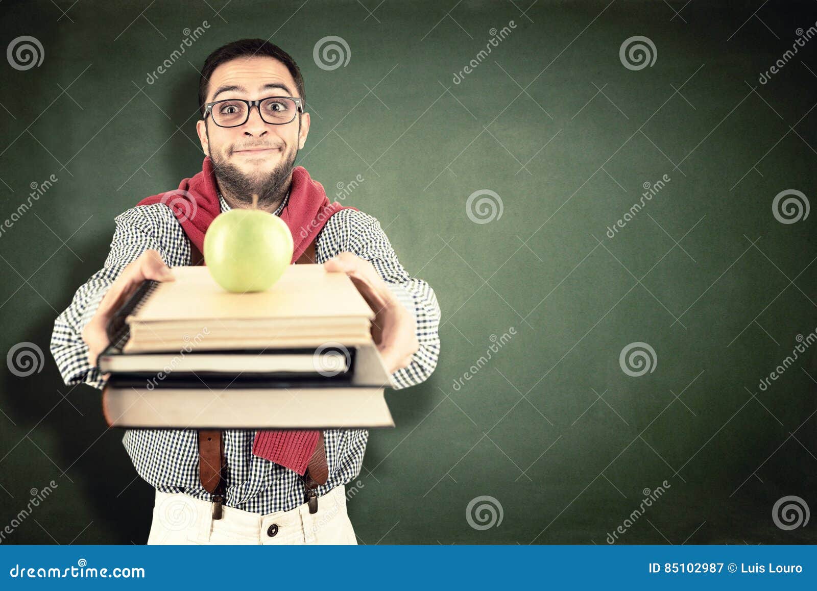 Nerd posing with books stock image. Image of suspenders - 85102987