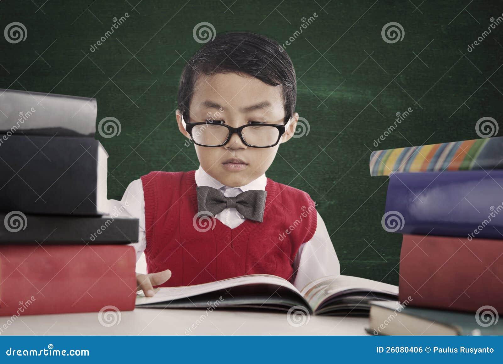 Nerd pupil reads book stock photo. Image of child, learn - 26080406