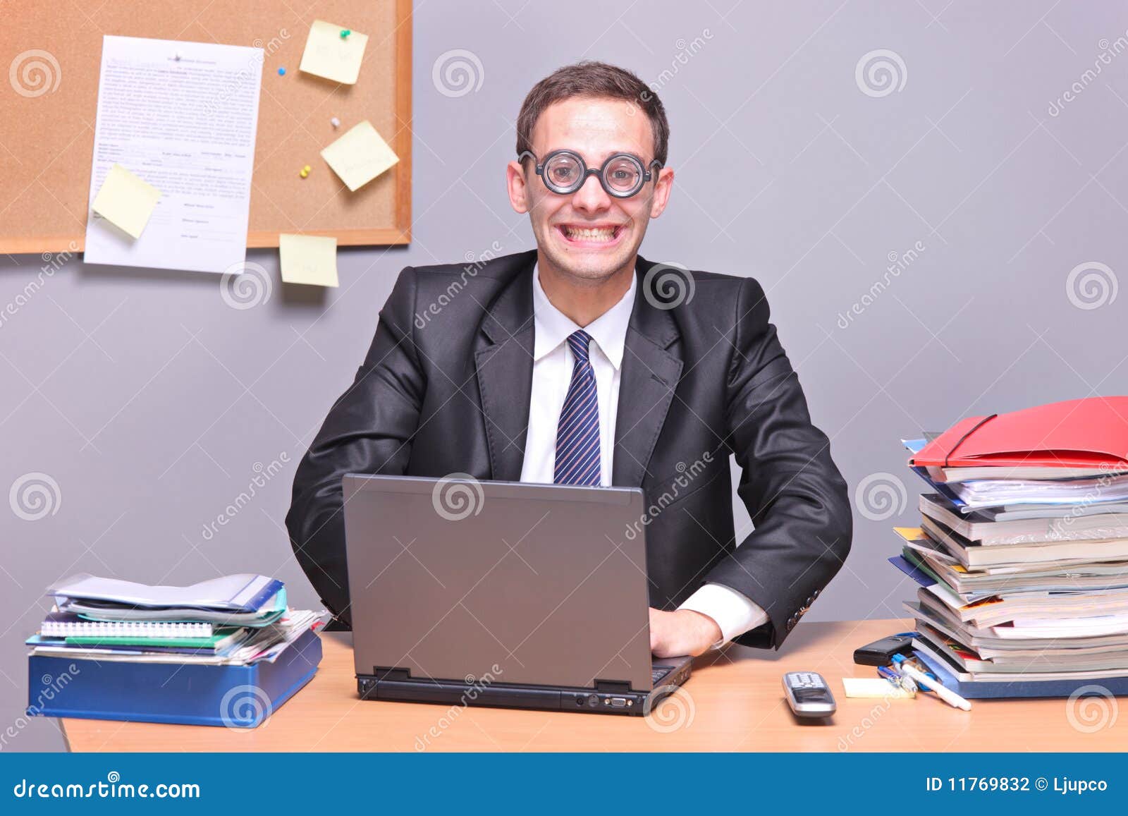 Nerdy Businessman Working on a Laptop Stock Photo - Image of mood ...