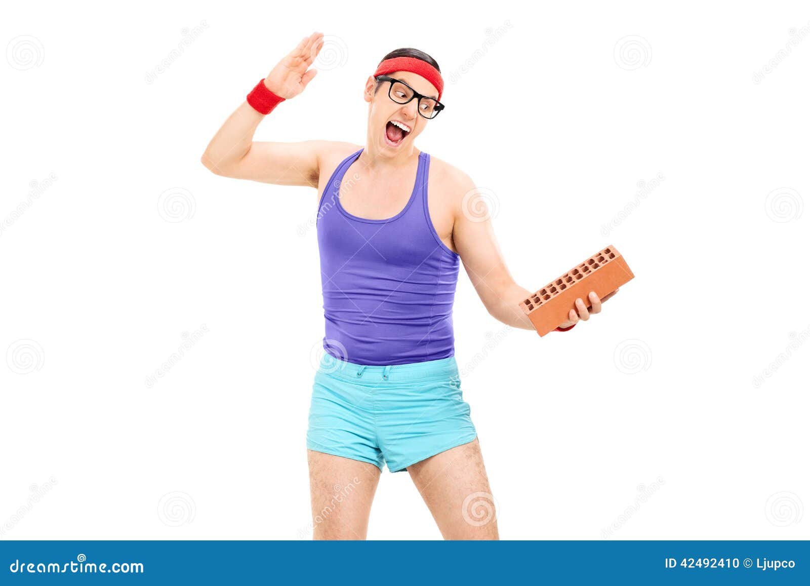 Nerdy Guy Trying To Break a Brick Stock Photo - Image of breaking, geek ...