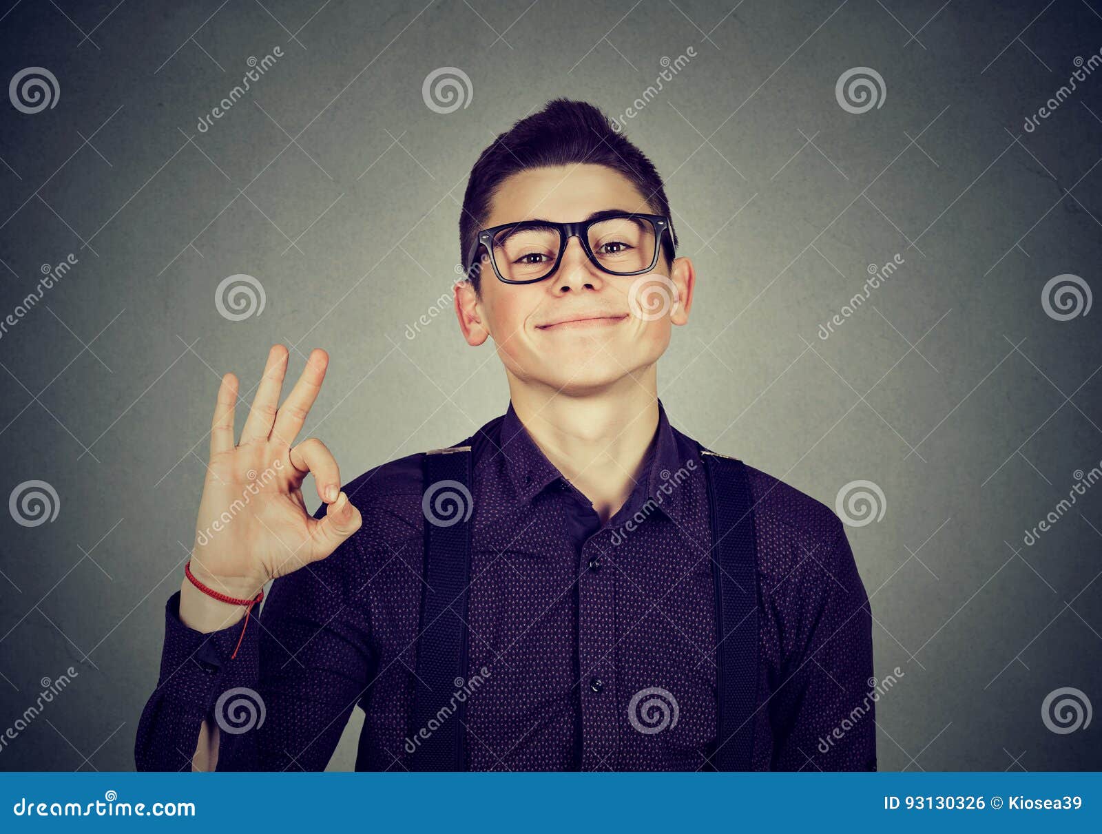 Nerdy man showing ok sign stock photo. Image of confident - 93130326