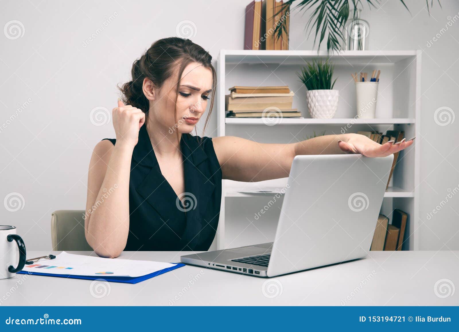 Nervous Andangry Woman in Office Closing Her Computer. Stock Image ...
