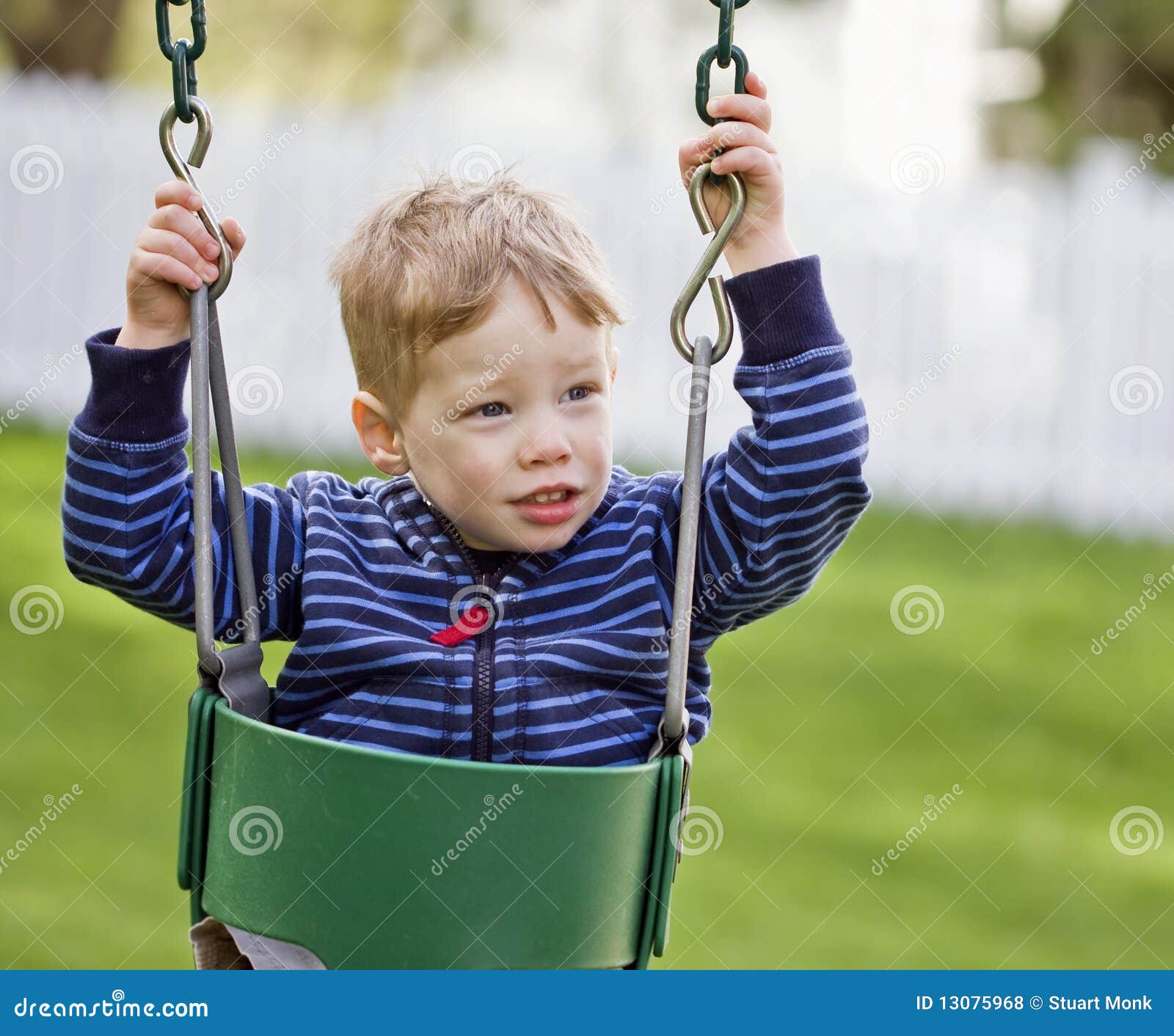 Nervous boy on swing stock photo. Image of worried, outside - 13075968