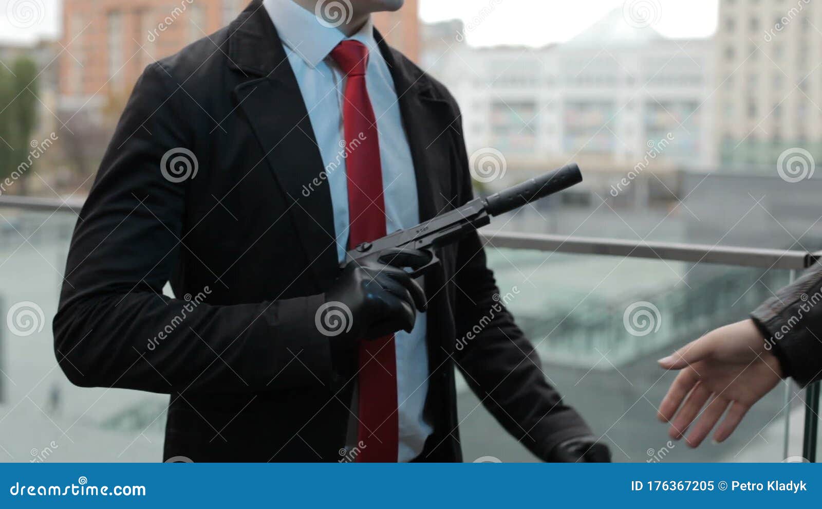 Nervous killer with a gun. stock video. Video of criminality - 176367205