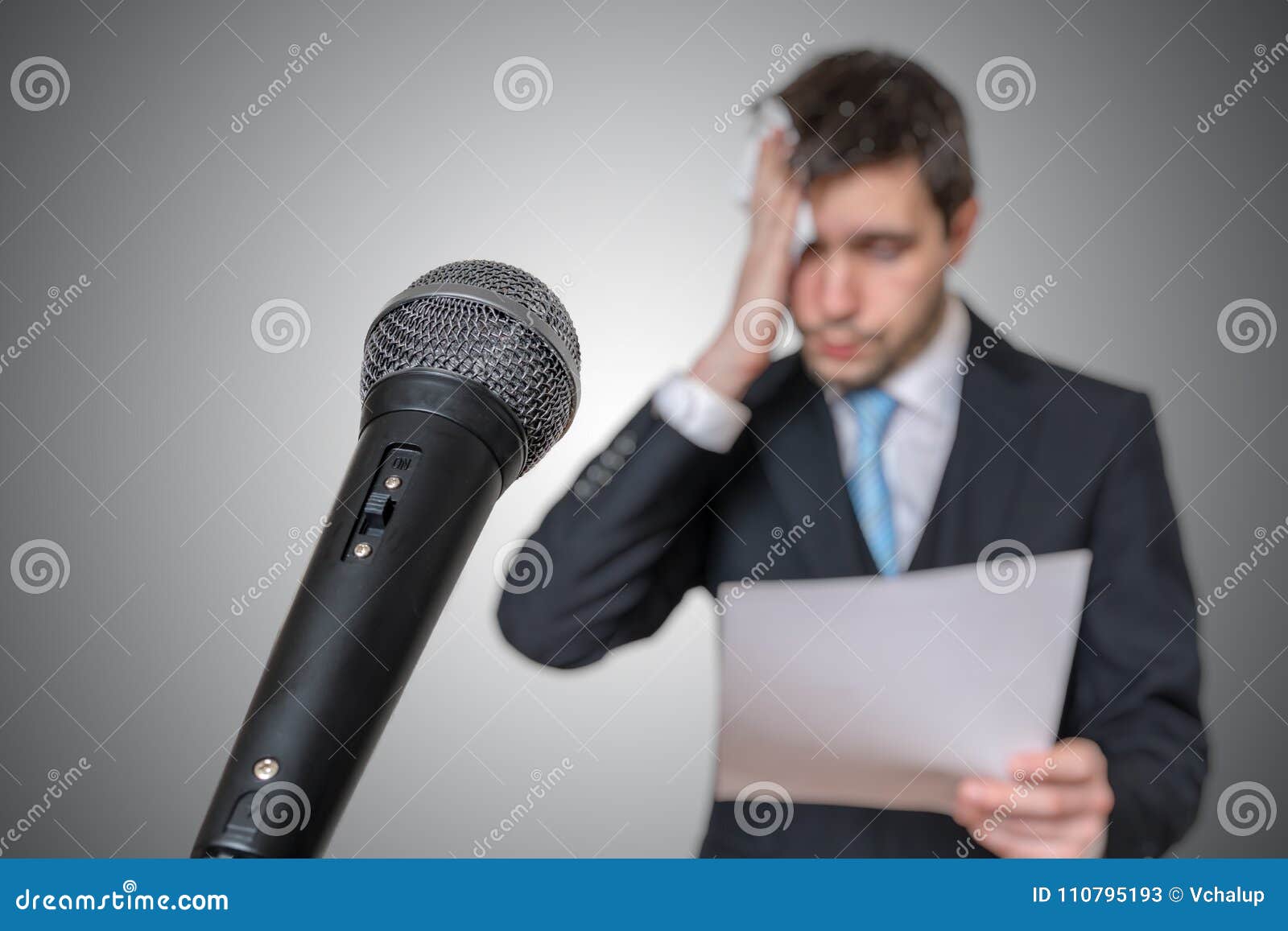 Nervous Man is Afraid of Public Speech and Sweating. Microphone in ... Nervous Man is Afraid of Public Speech and Sweating. Microphone in ...