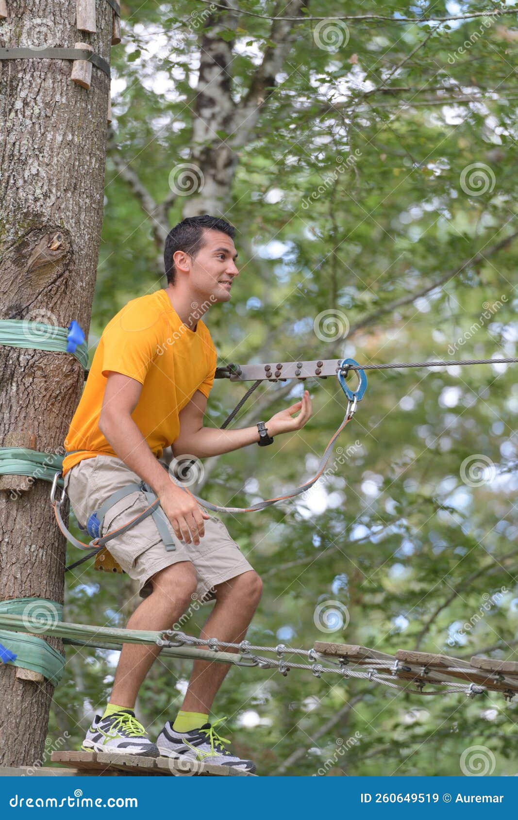 Nervous Man Preparing To Descend Zip Wire Stock Image - Image of ...