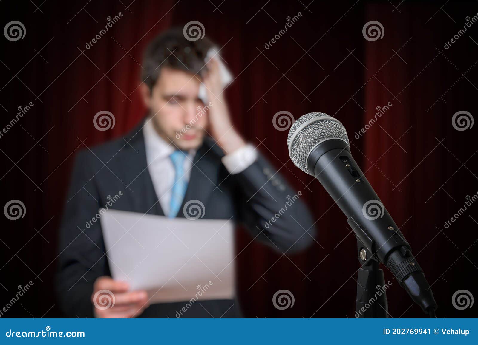 Nervous Speaker is Afraid of Public Speech and is Sweating. Microphone ... Nervous Speaker is Afraid of Public Speech and is Sweating. Microphone ...