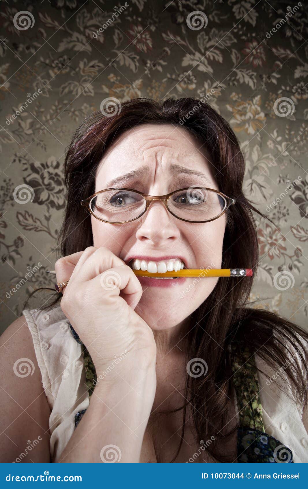 Nervous Woman Chewing on a Pencil Stock Photo - Image of tense, point ...