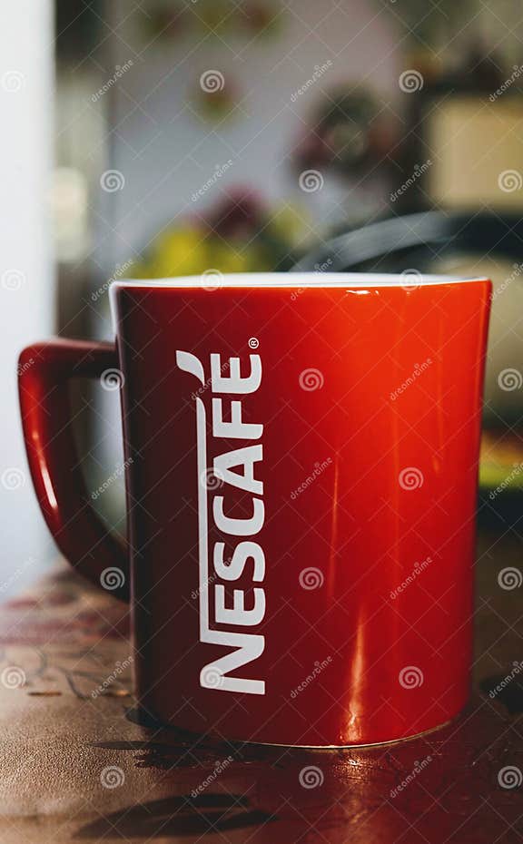 Nescafe coffee mug (red) editorial photography. Image of product ...