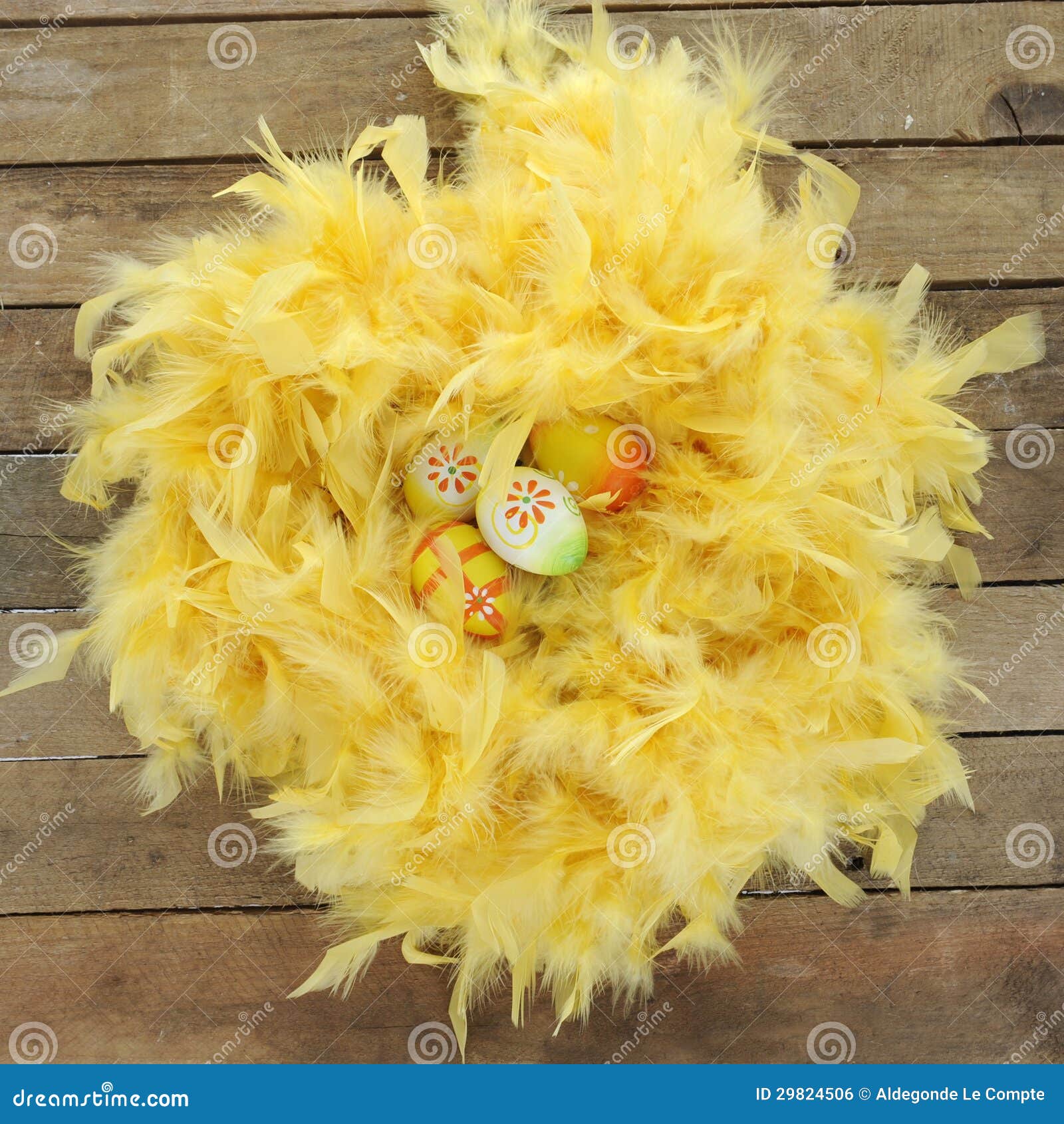 Nest Made of Yellow Feathers with Easter Eggs Stock Photo - Image of ...