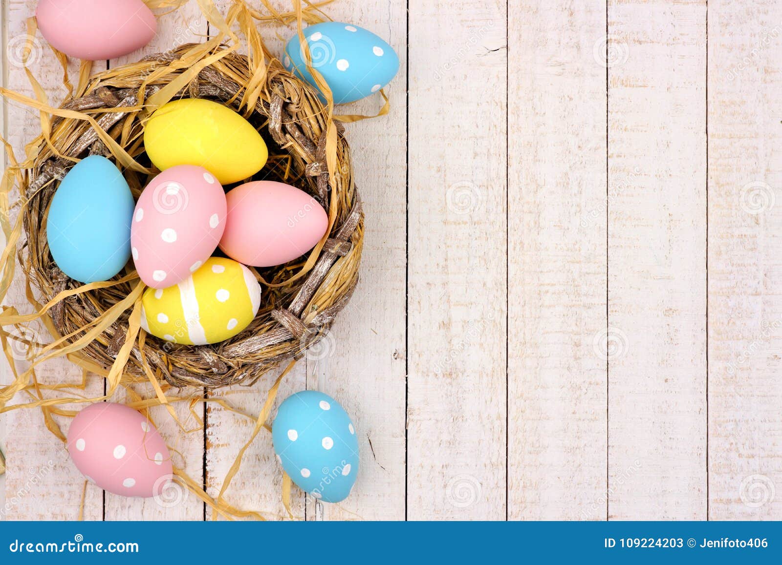 Nest Side Border with Pink, Yellow & Blue Easter Eggs Against White ...