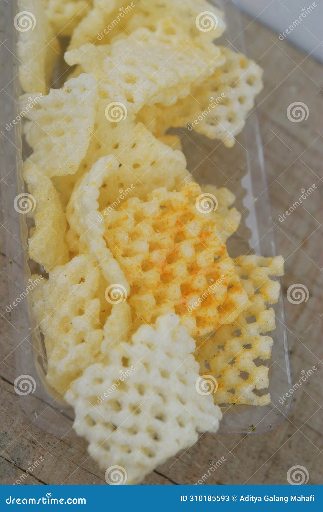 Net Chips in a Plastic Container is Good for Kids Stock Image - Image ...