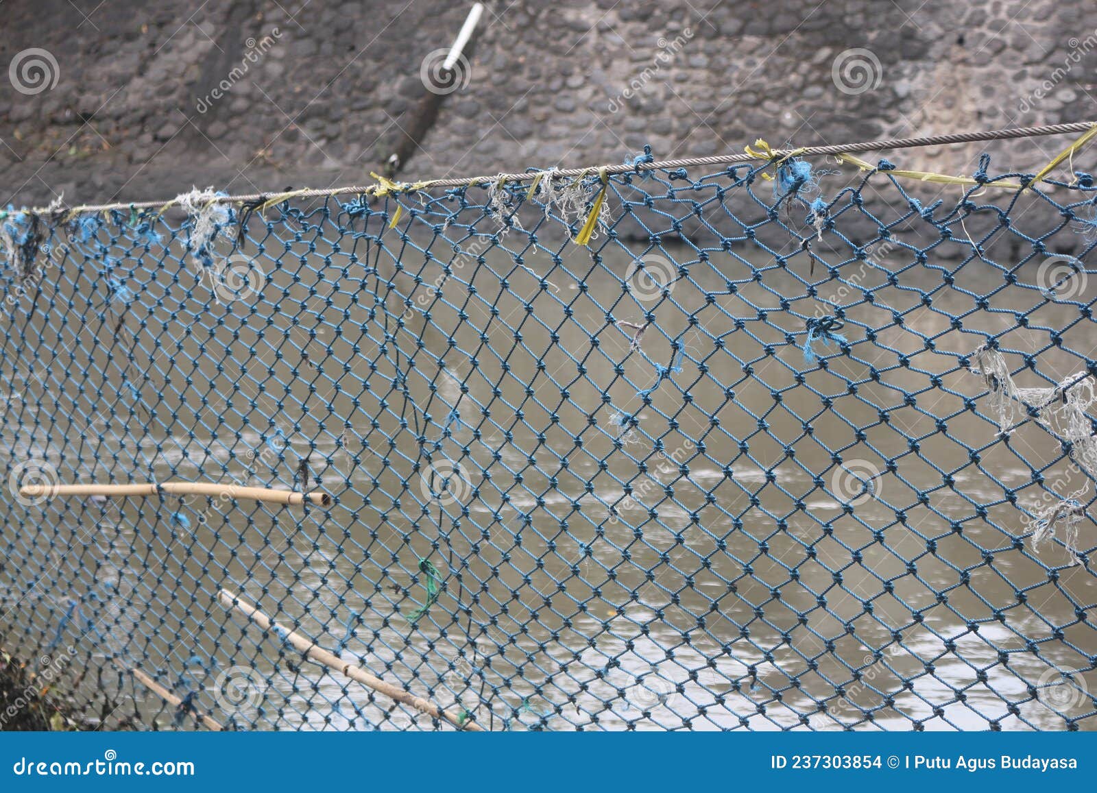 A Net Installed in a River that Serves To Hold and Collect Garbage ...