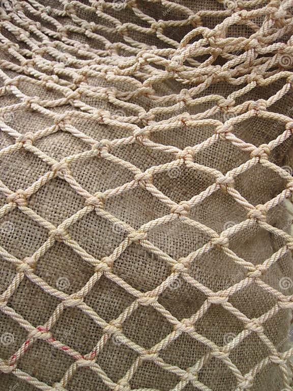 Net on linen fabric stock photo. Image of hole, fiber - 38383996