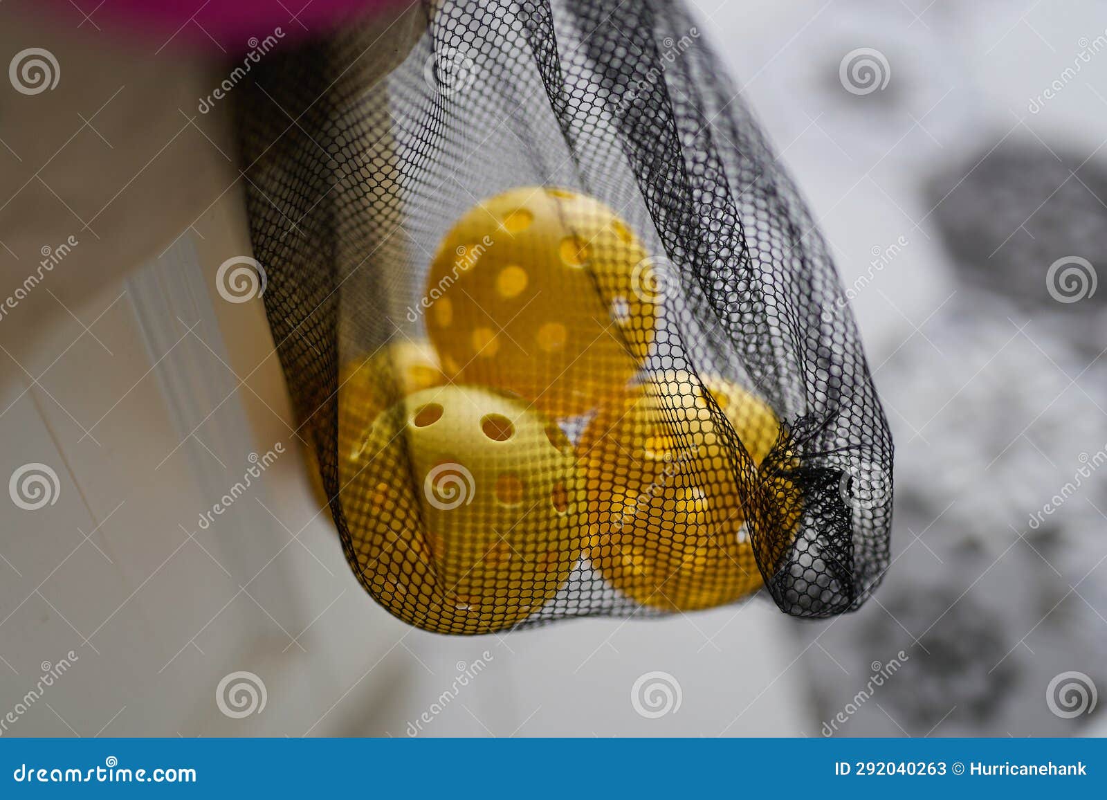 Net with Perforated Plastic Balls for Pickleball Game Stock Image ...