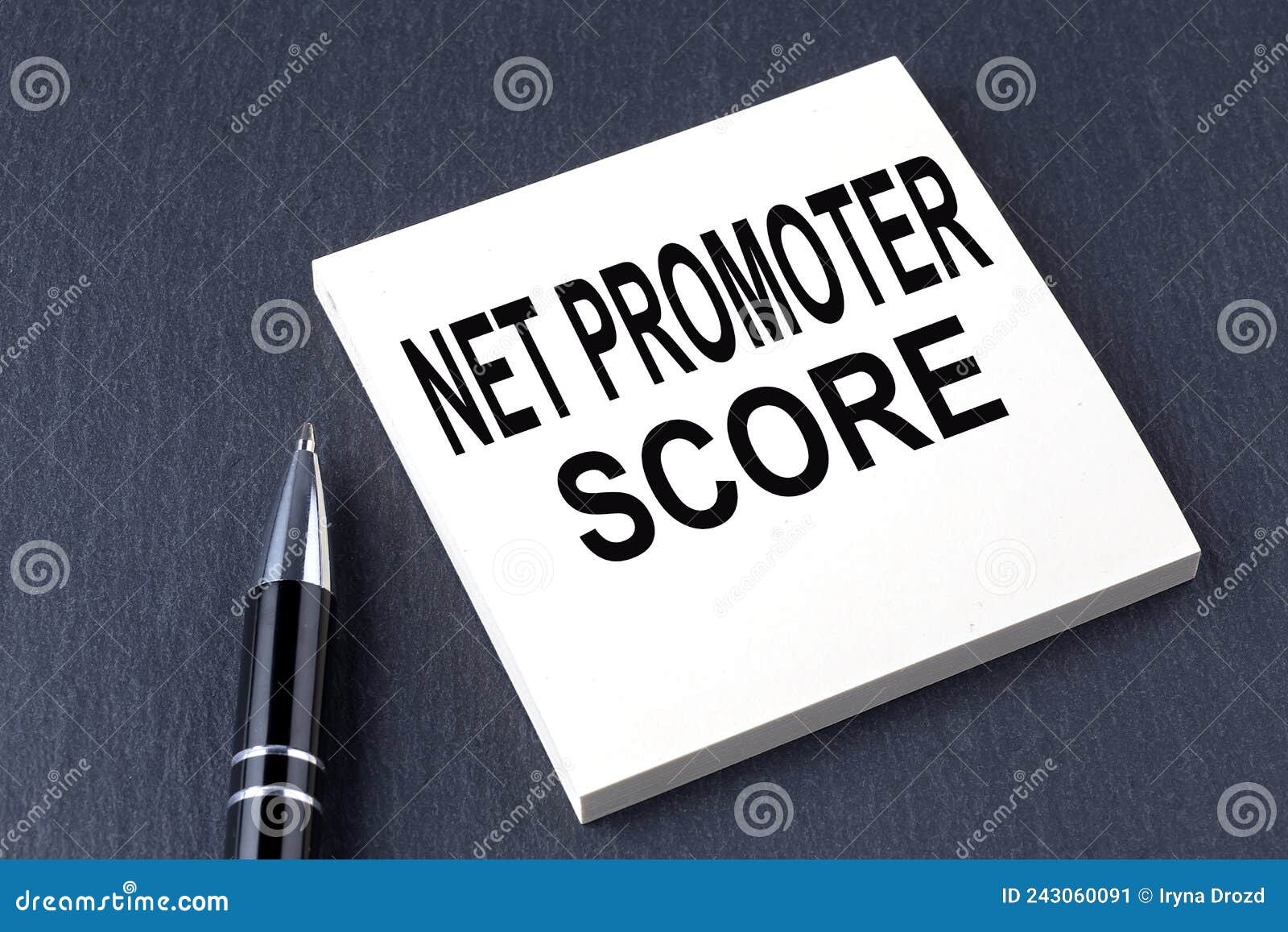 NET PROMOTER SCORE Text on the Sticker with Pen on the Black Background ...