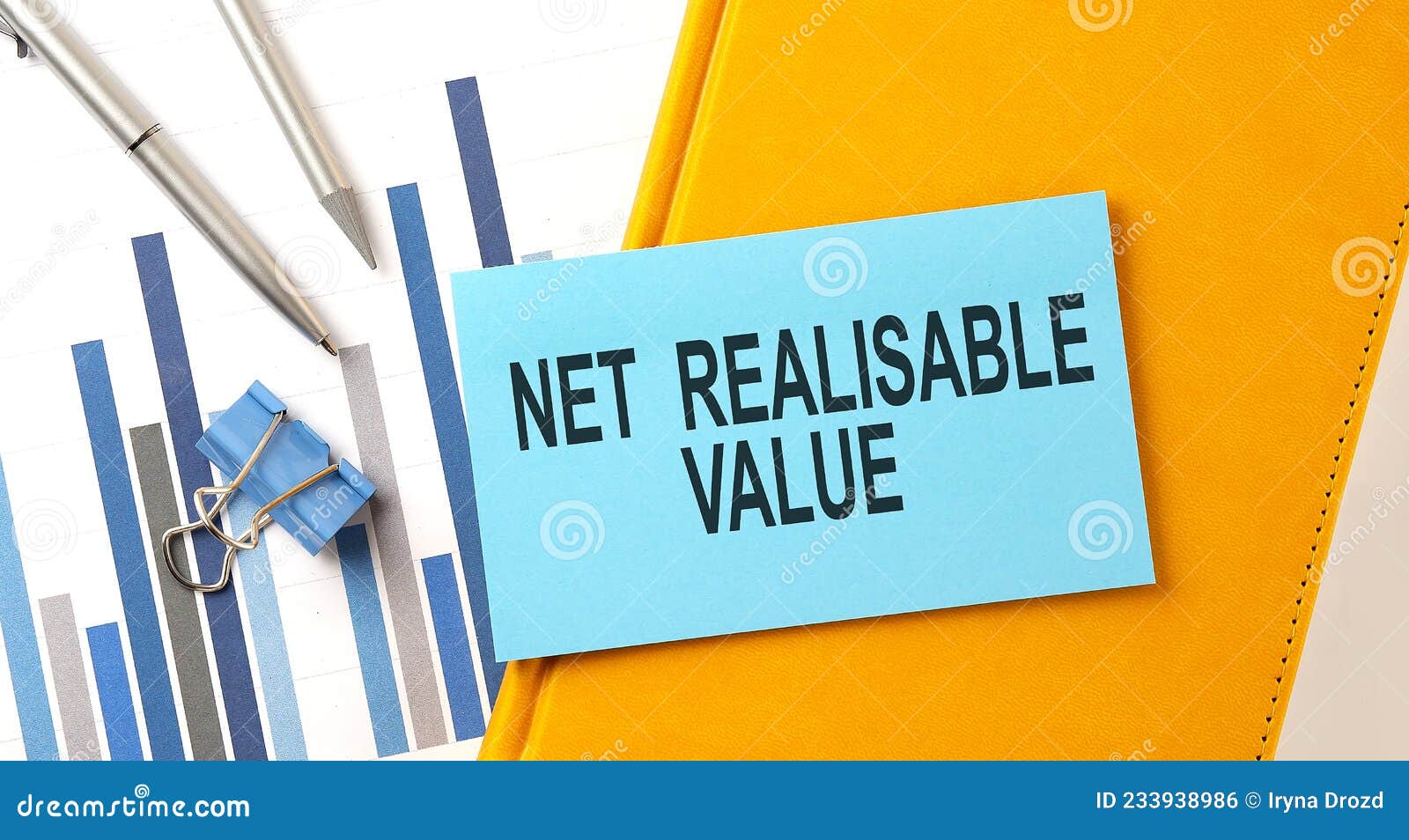 NET REALISABLE VALUE Text on Sticker on Yellow Notebook with Chart and ...