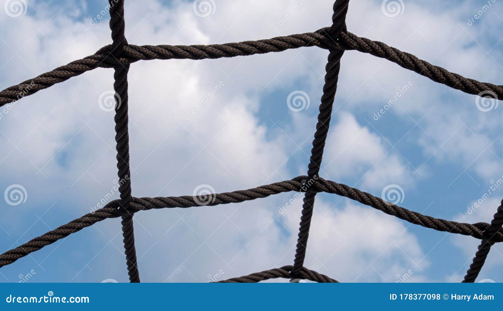 Net of Ropes in Front of a Blue Sky with Clouds Stock Photo - Image of ...