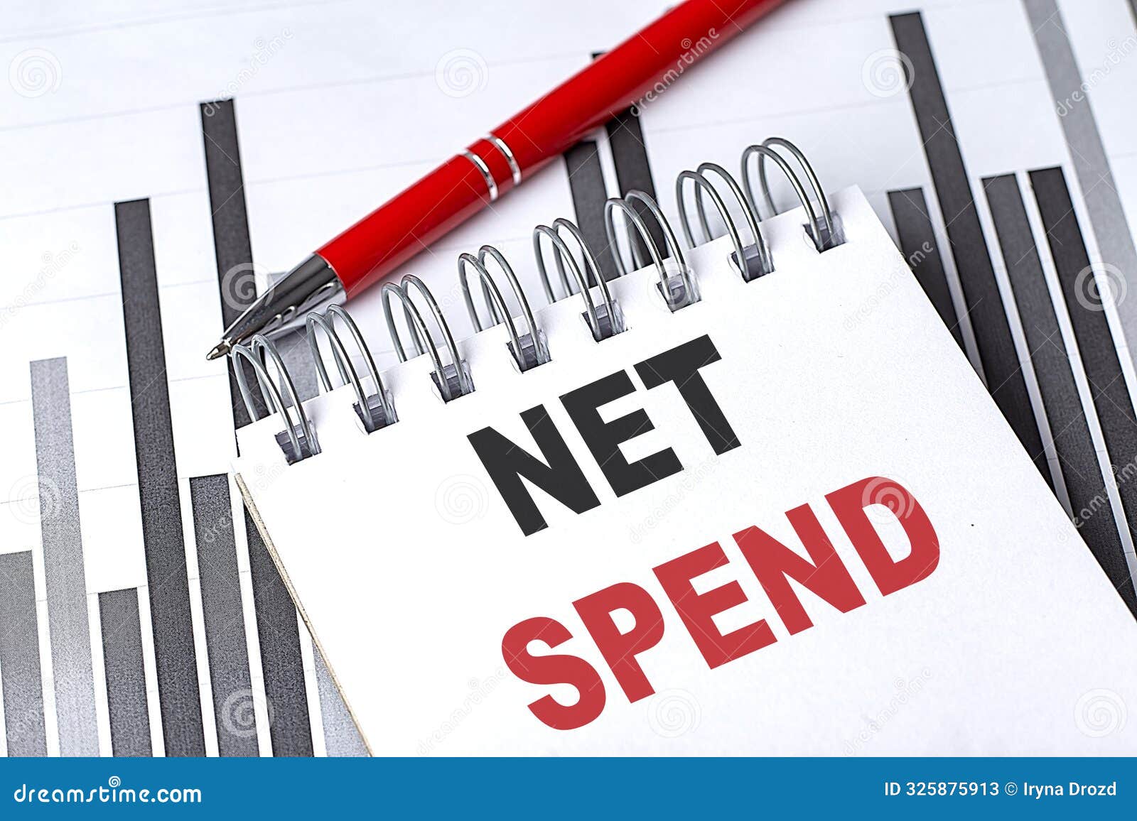 NET SPEND Text on Notebook on Chart with Pen Stock Image - Image of ...