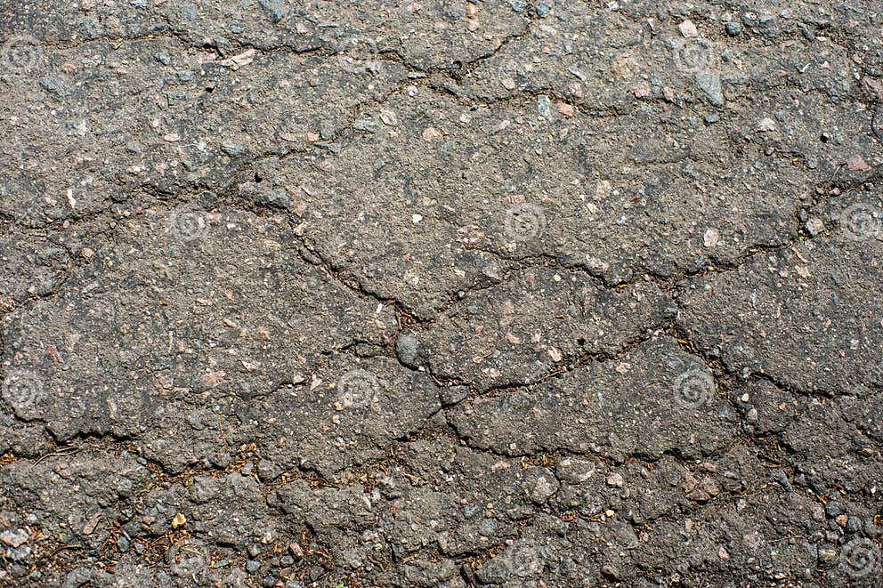 A Network of Black Cracks on the Asphalt Surface. Road Texture with ...