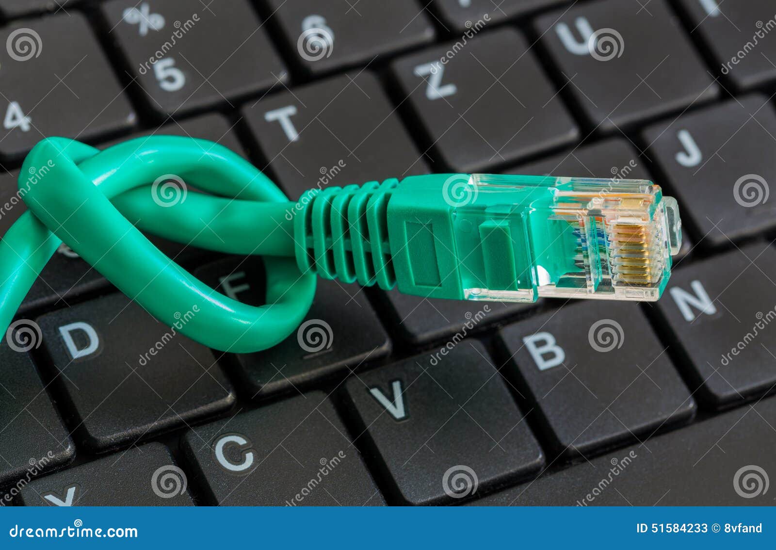 Network Cable with Green Knot and Keyboard Stock Image - Image of ...