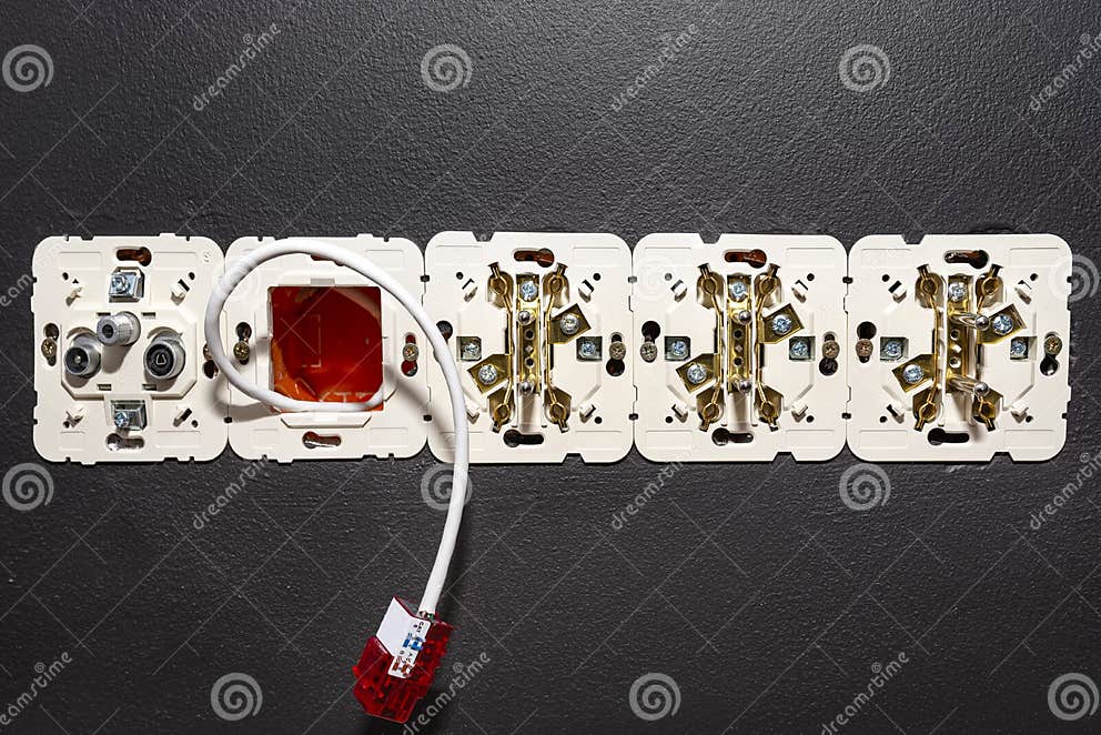 A Network Cable Protruding from the Wall with a Ready RJ45 Module To ...