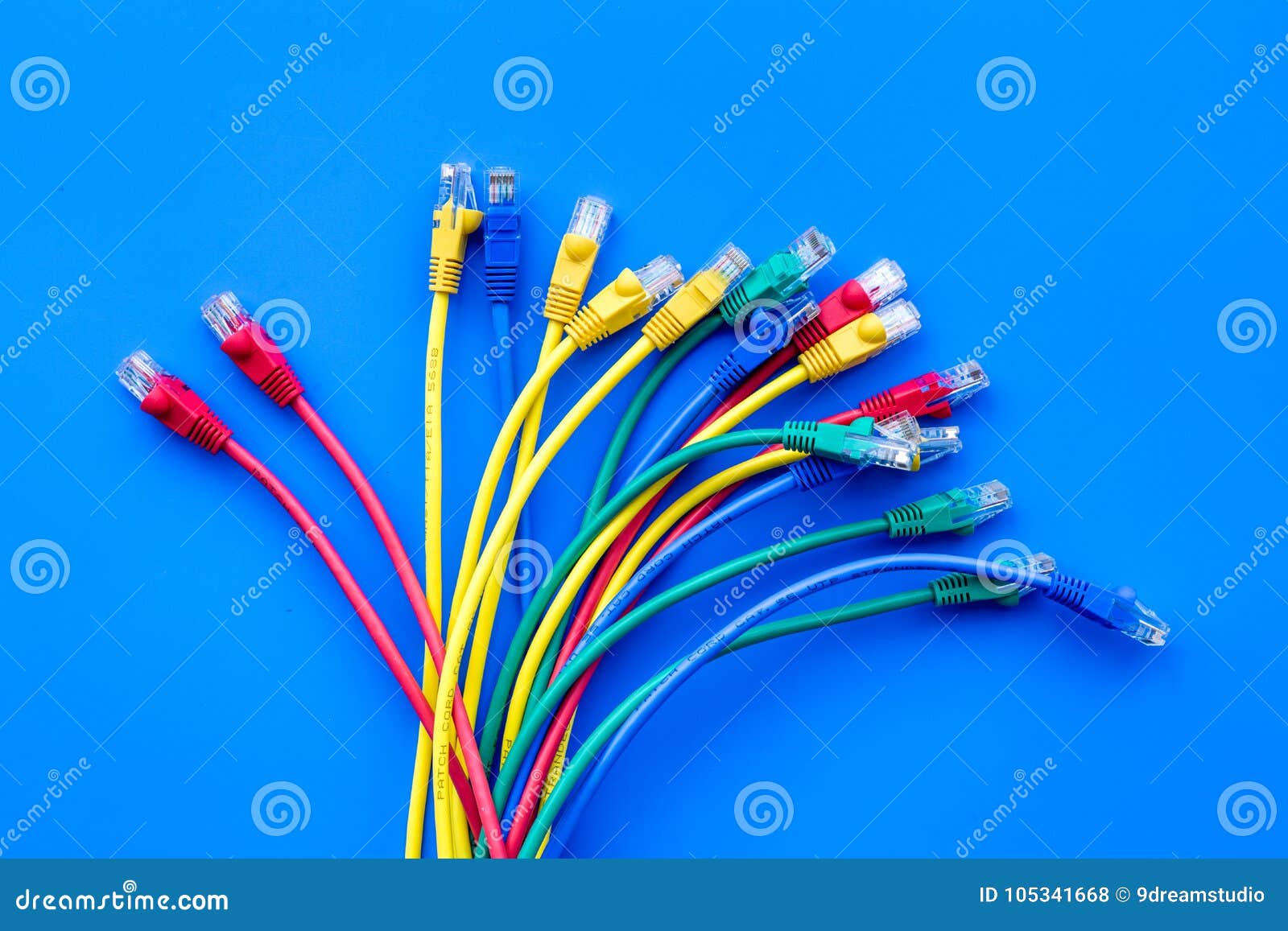 Network Colored Cables for Computer on Blue Background Top View Stock ...