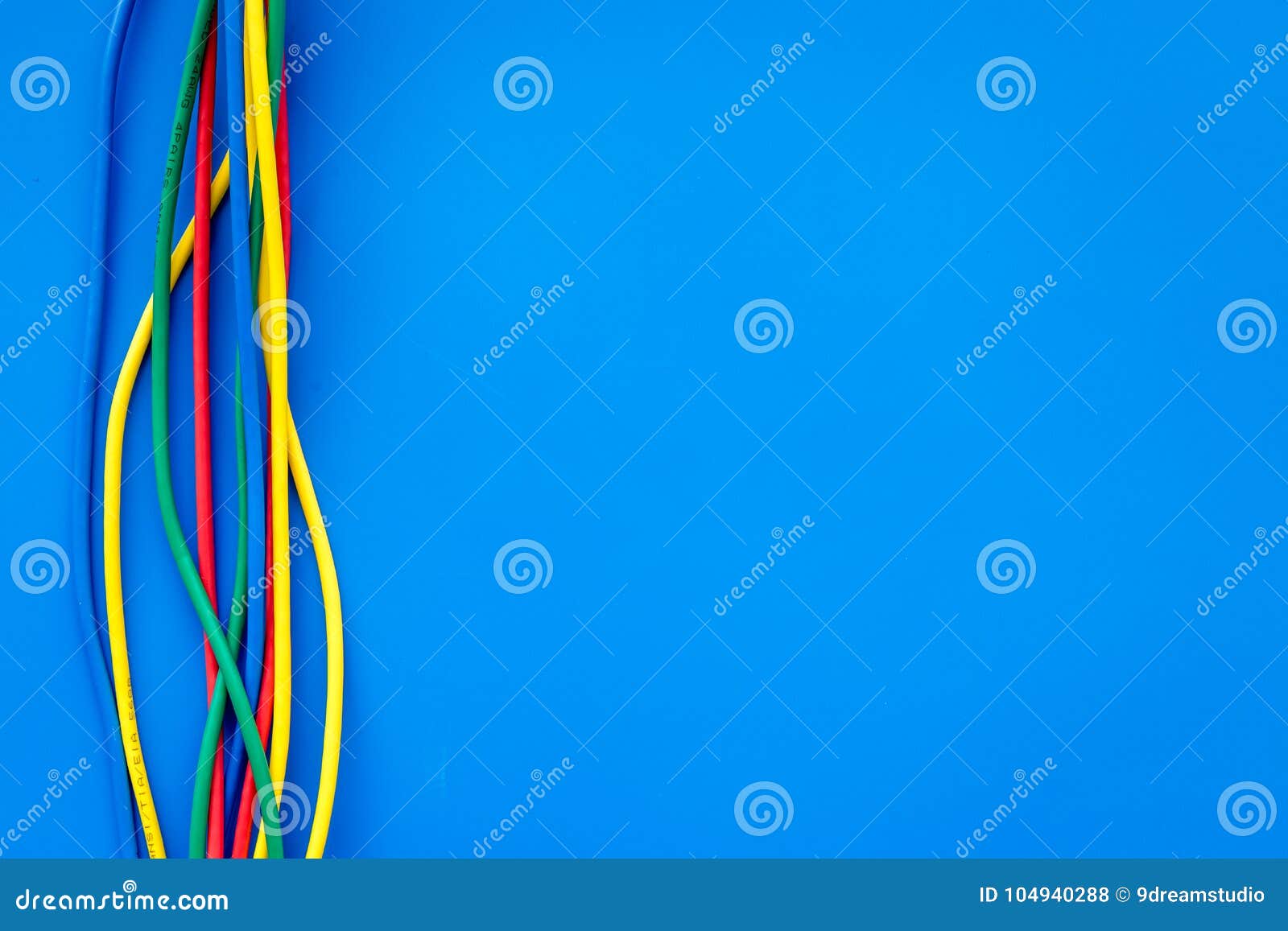 Network Colored Cables for Computer on Blue Background Top View ...
