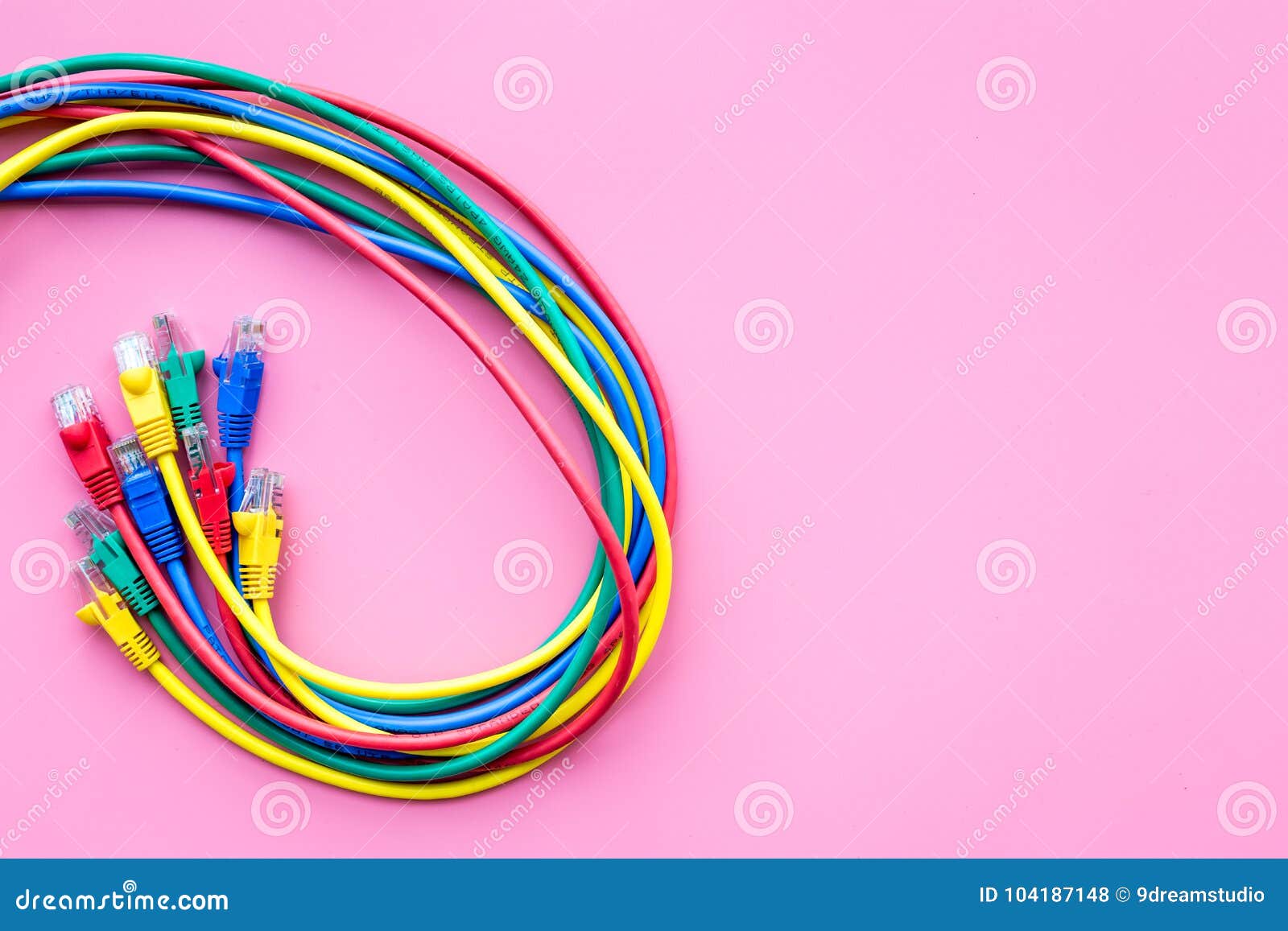 Network Colored Cables for Computer on Pink Background Top View ...