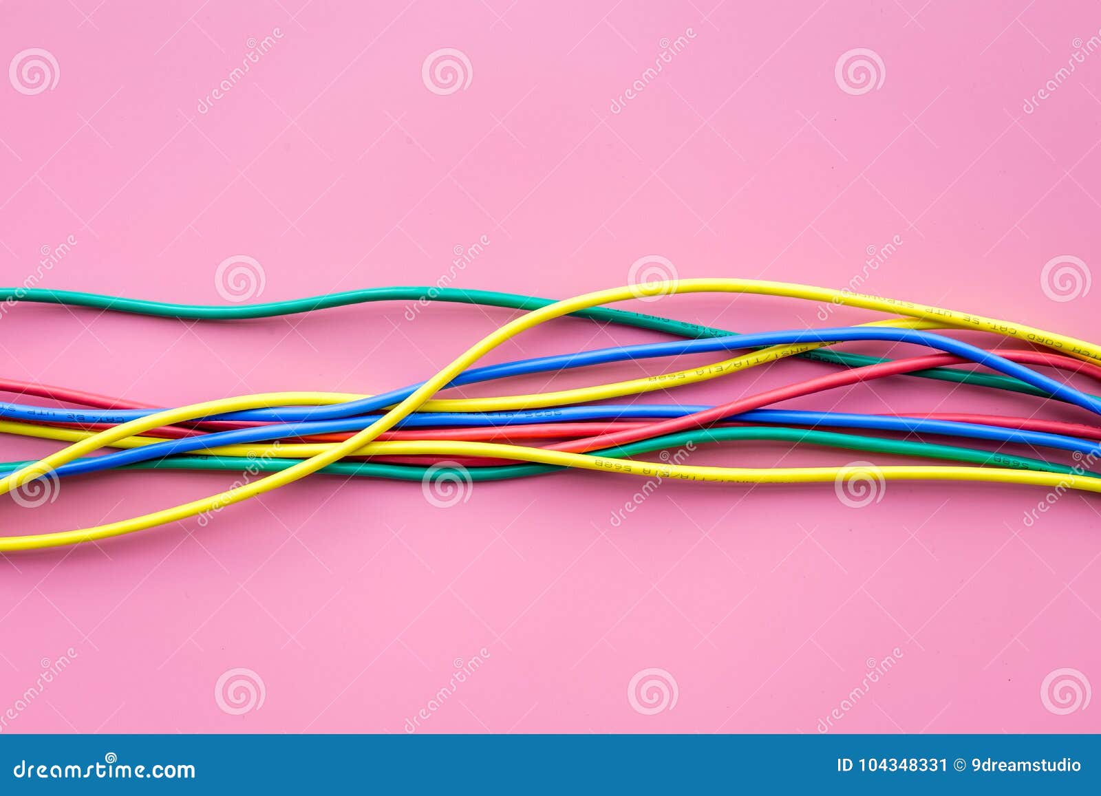Network Colored Cables for Computer on Pink Background Top View ...