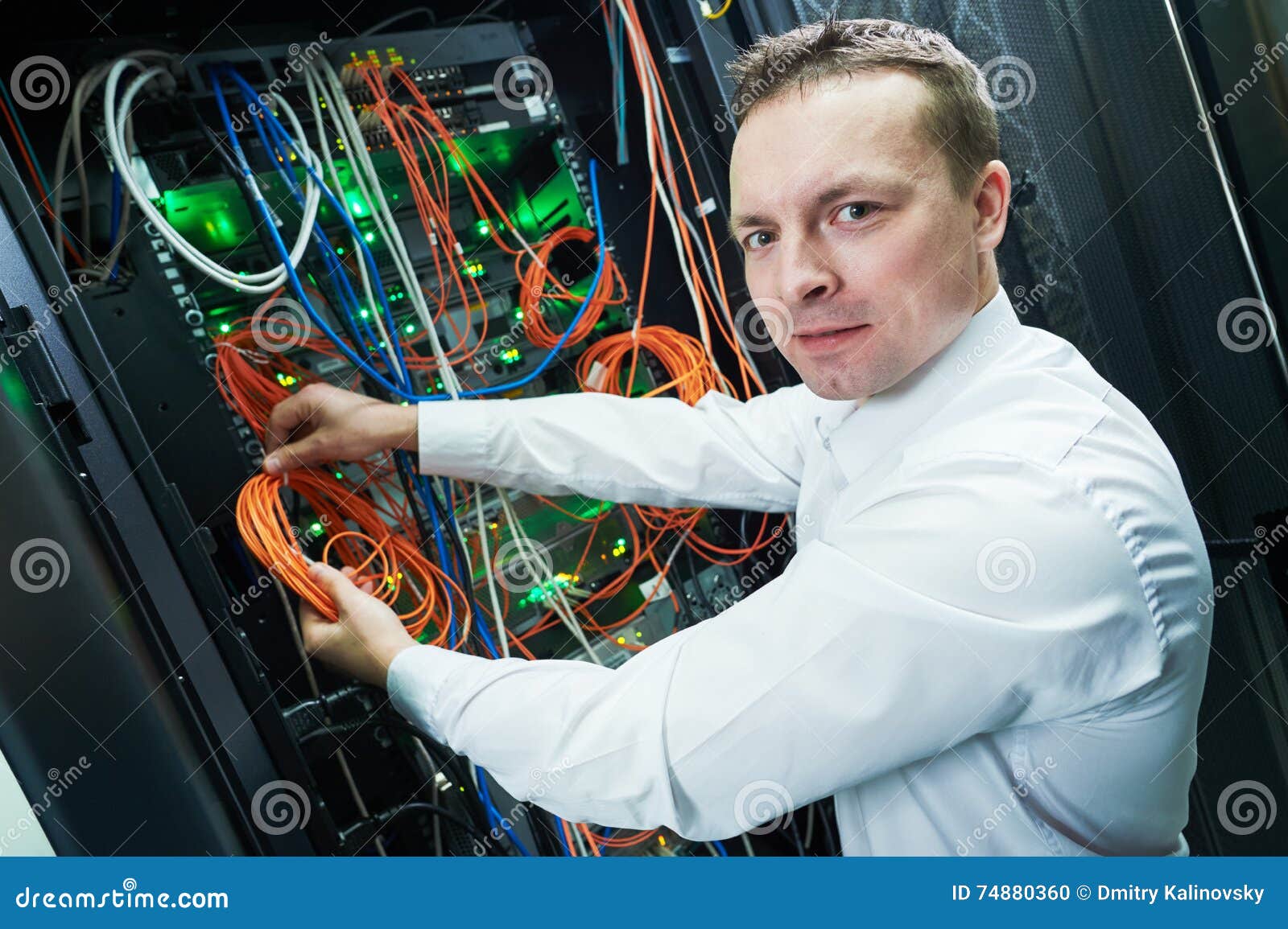 Network Engineer Administrating in Server Room Stock Photo - Image of ...