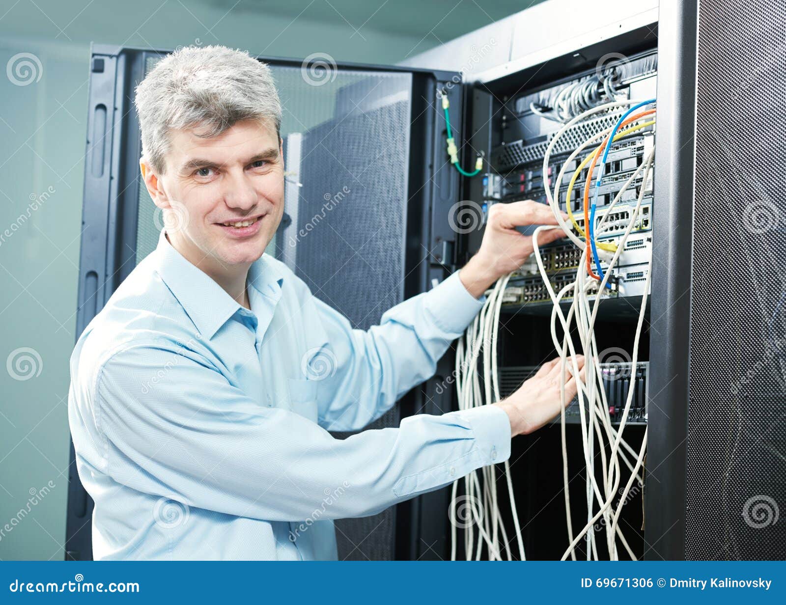 Network Engineer Administrator in Server Room Stock Photo - Image of ...