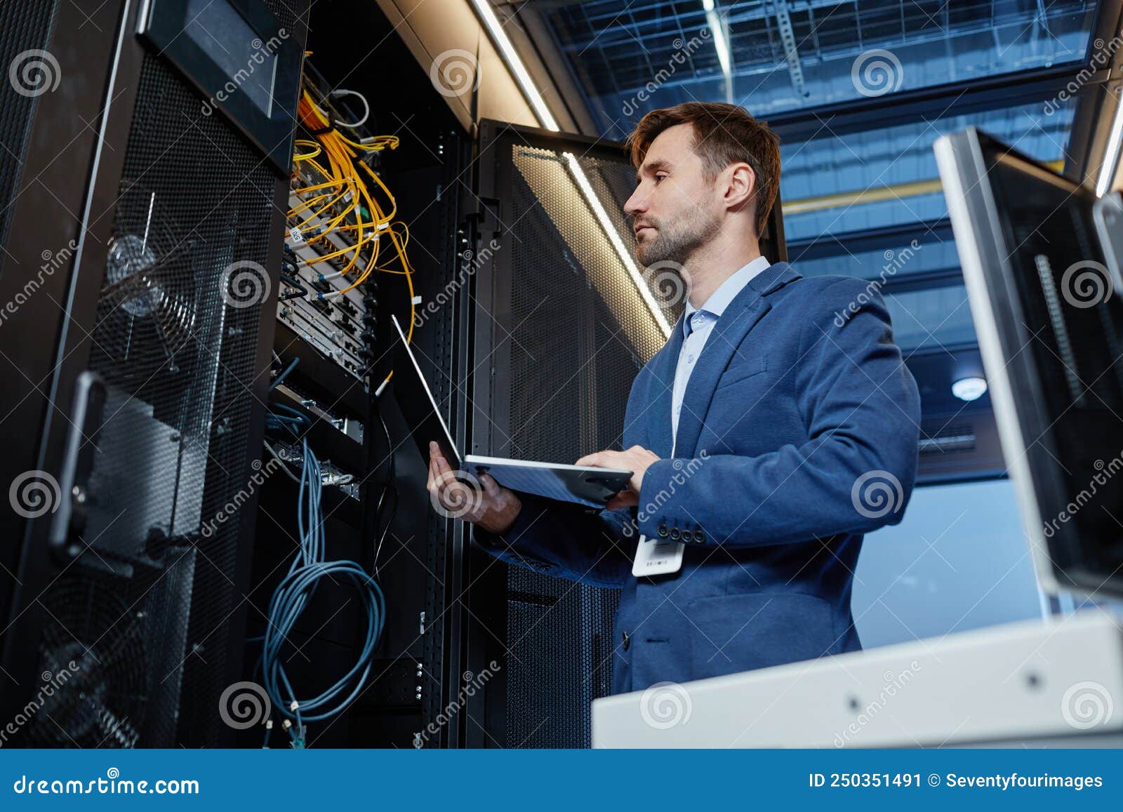 Network Engineer Inspecting Servers Stock Image - Image of industry ...