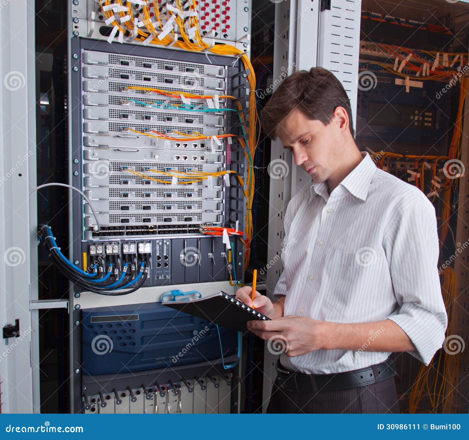 Network Engineer in Server Room Stock Image - Image of caucasian, book ...
