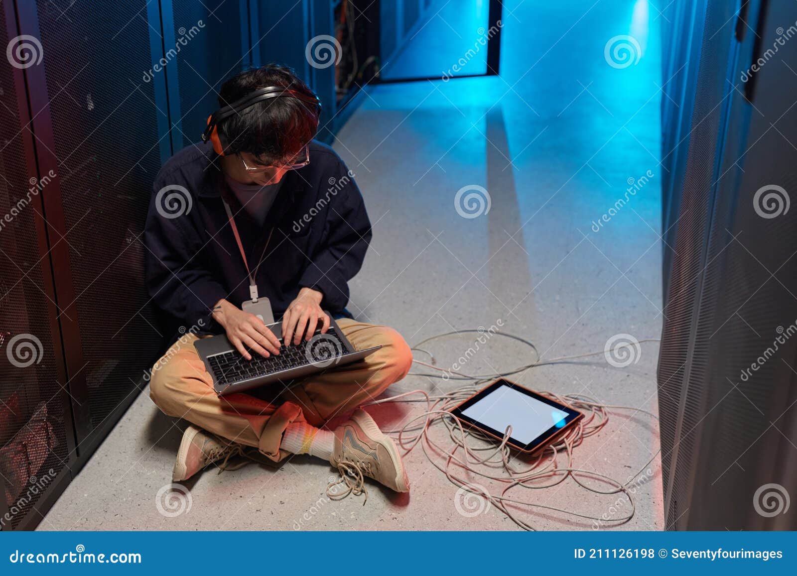Network Engineer Using Laptop in Data Center Stock Photo - Image of ...