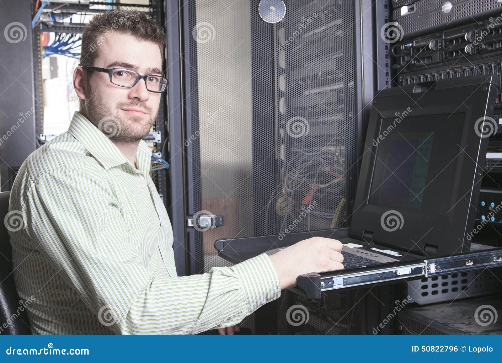 Network Engineer Working in Server Room Stock Photo - Image of system ...