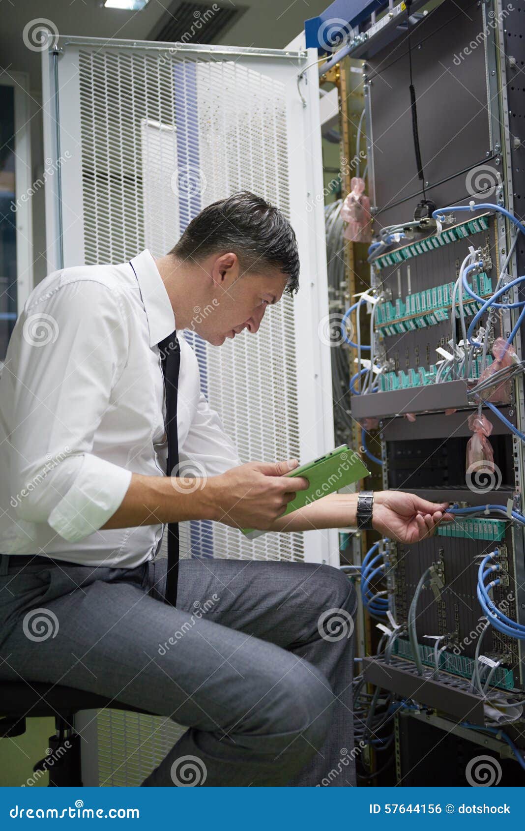 Network Engineer Working in Server Room Stock Photo - Image of center ... Network Engineer Working in Server Room Stock Photo - Image of center ...