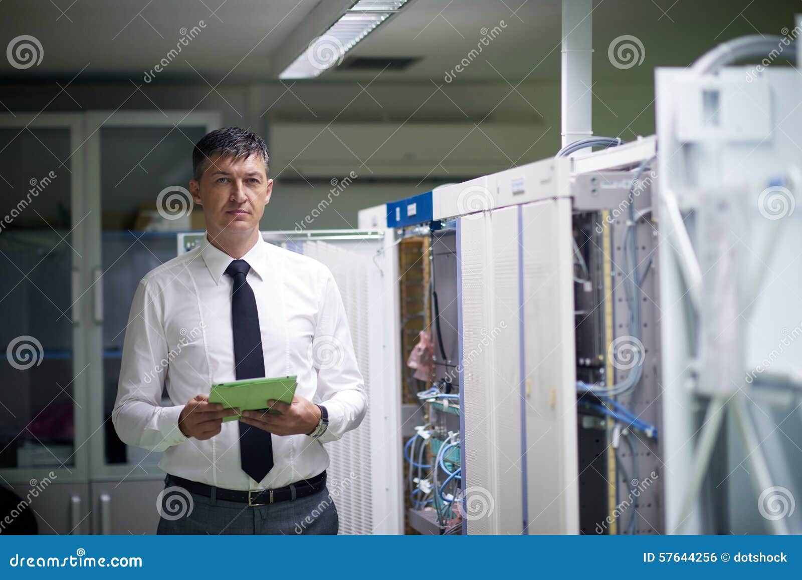Network Engineer Working in Server Room Stock Photo - Image of routers ...