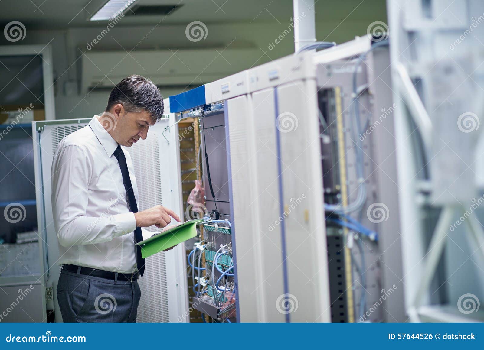 Network Engineer Working in Server Room Stock Photo - Image of ... Network Engineer Working in Server Room Stock Photo - Image of ...
