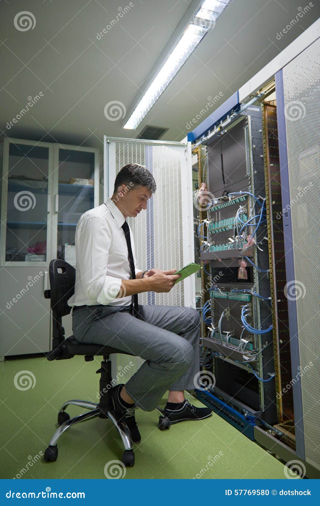 Network Engineer Working in Server Room Stock Photo - Image of male ...