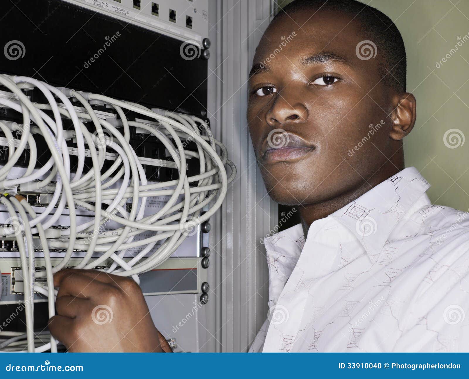 Network Engineer Working in Server Room Stock Photo - Image of server ...