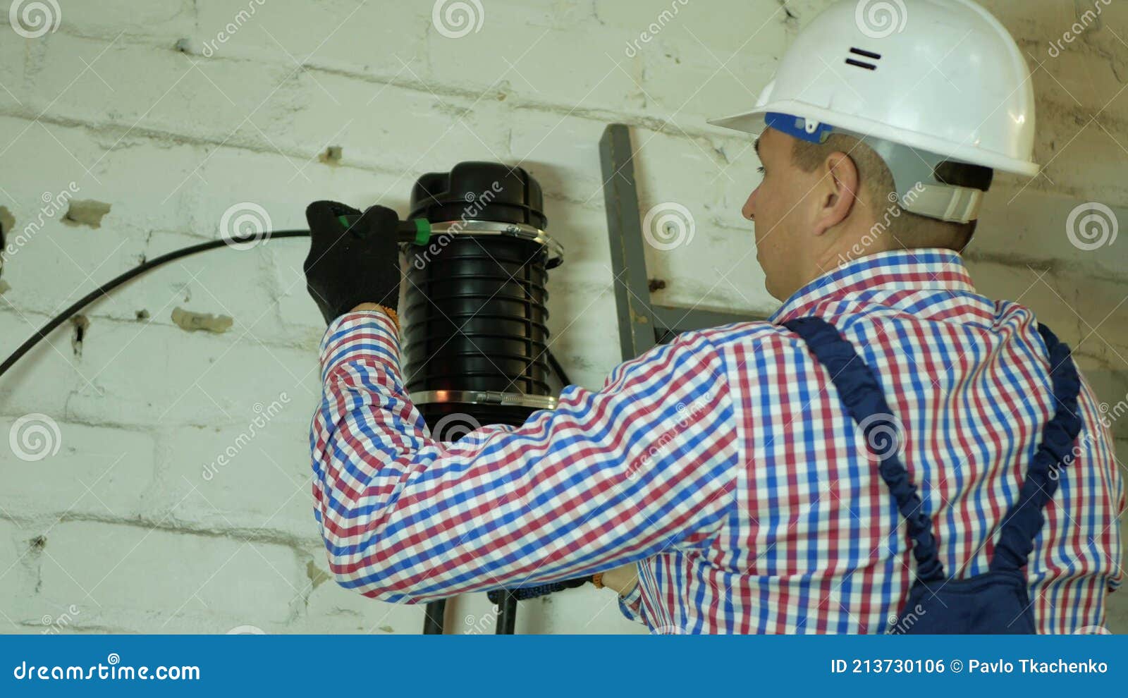 A Network Engineer Works with Optical Fiber Equipment Stock Photo ...
