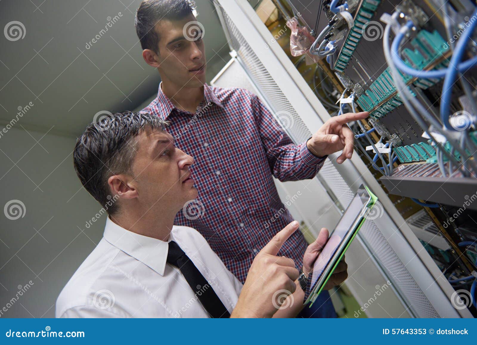 Network Engineers in Server Room Stock Image - Image of cable, rack ...