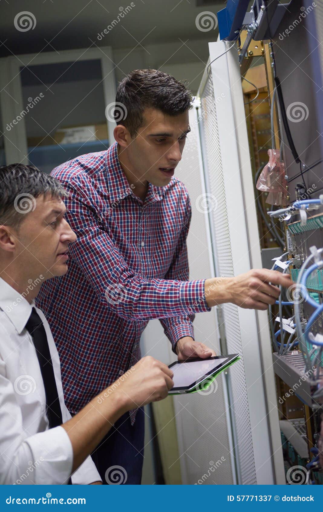Network Engineers in Server Room Stock Image - Image of people ...
