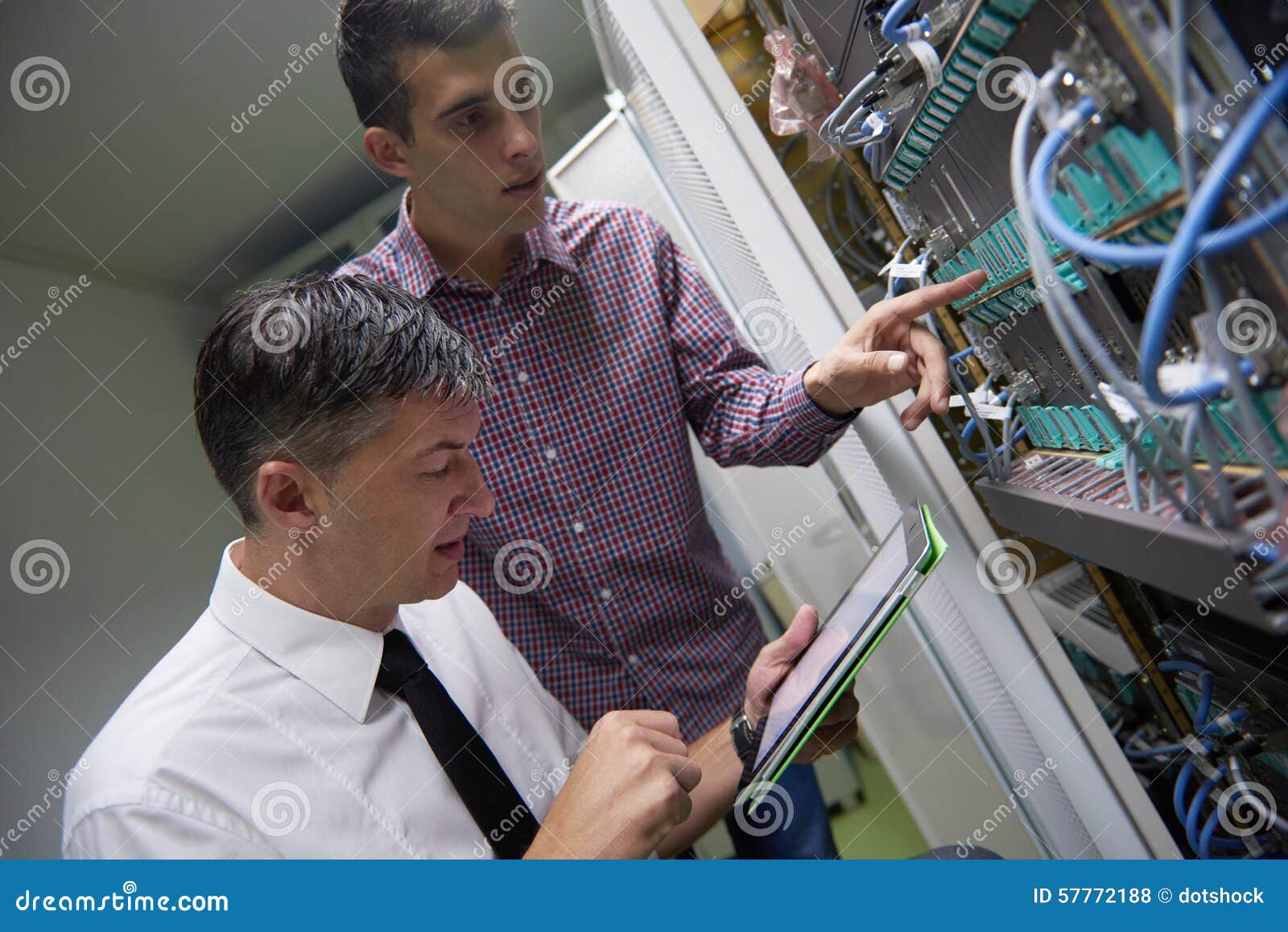 Network Engineers in Server Room Stock Photo - Image of meeting, group ...