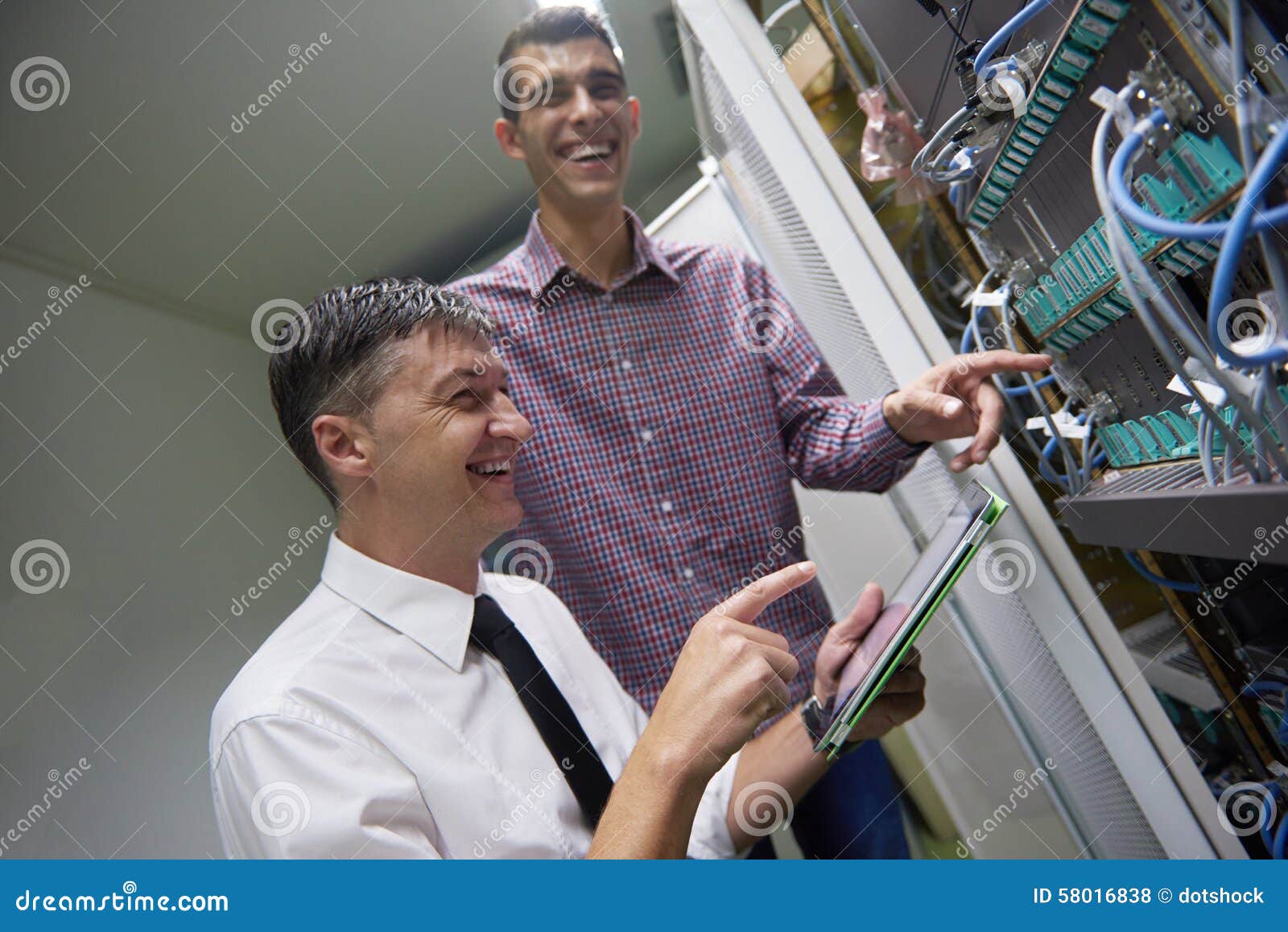 Network Engineers in Server Room Stock Photo - Image of information ...